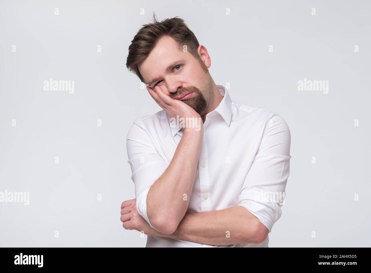 Man hand on cheek hi-res stock photography and images - Alamy