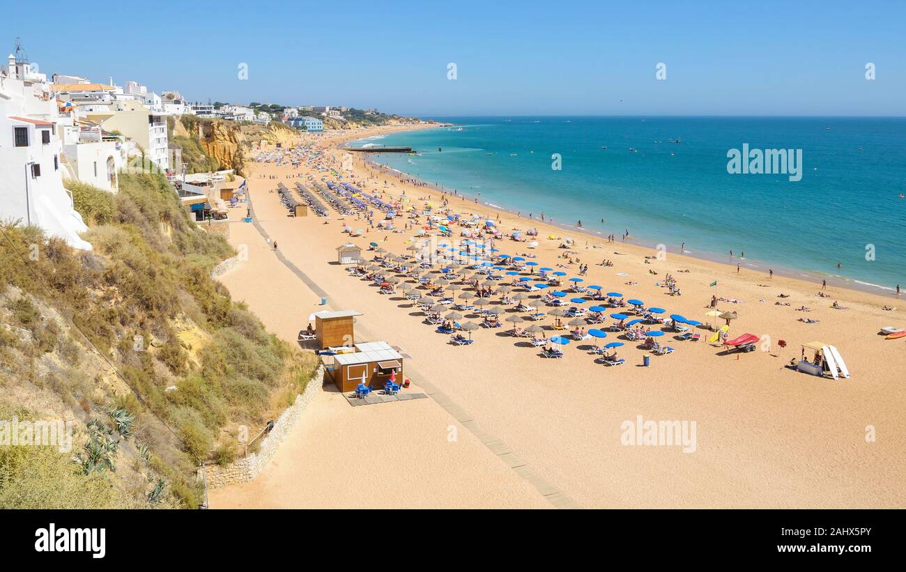 View of sunny public beach in Albufeira, Algarve, Portugal Stock Photo ...