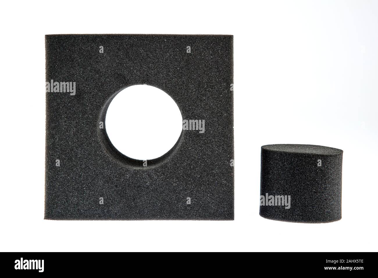 Technical Round Sponge. Black sponge foam in a shape of electronic or ...