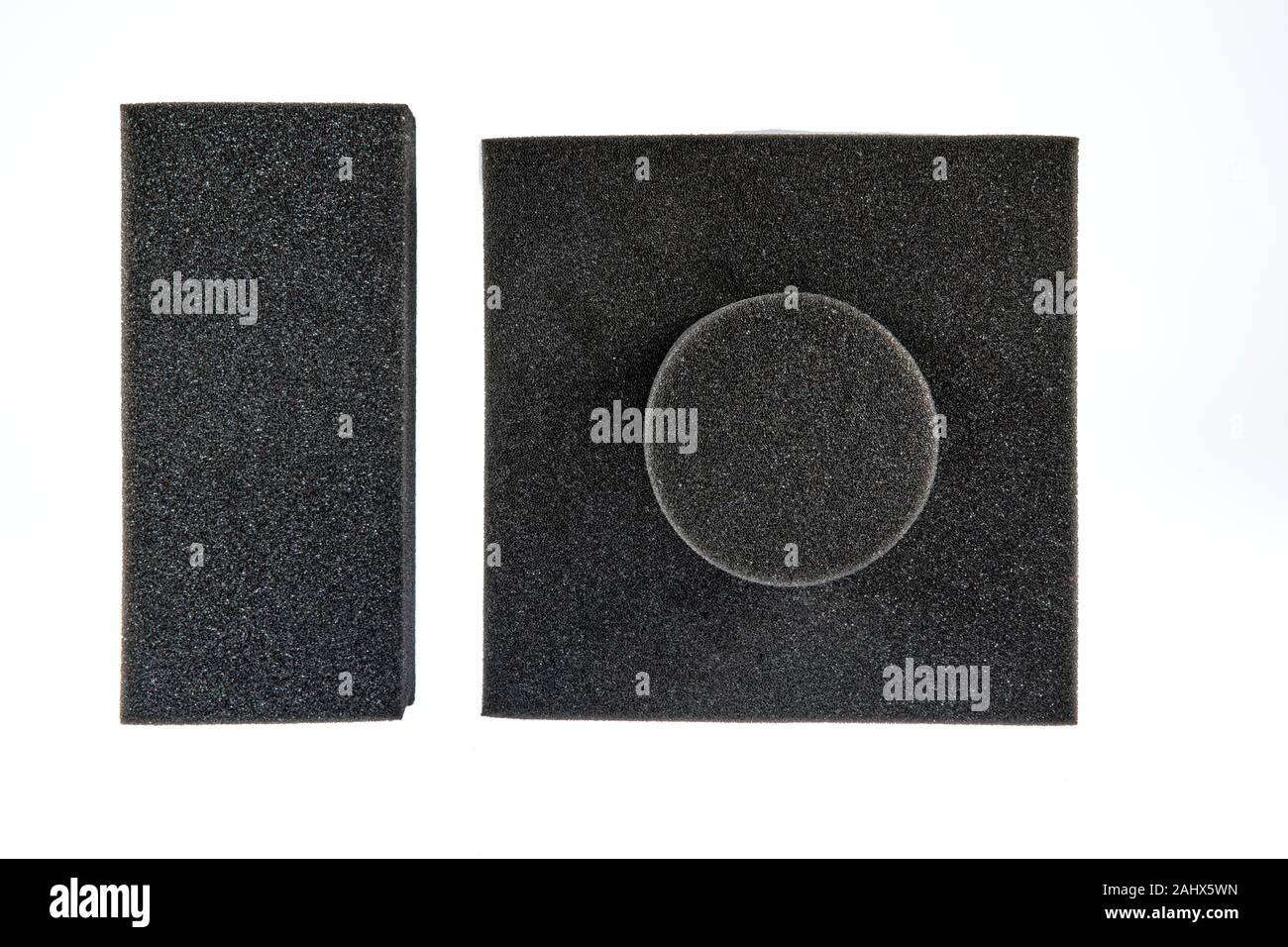 Technical Round Sponge. Black sponge foam in a shape of electronic or ...