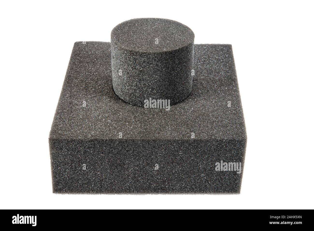 Technical Round Sponge. Black sponge foam in a shape of electronic or ...
