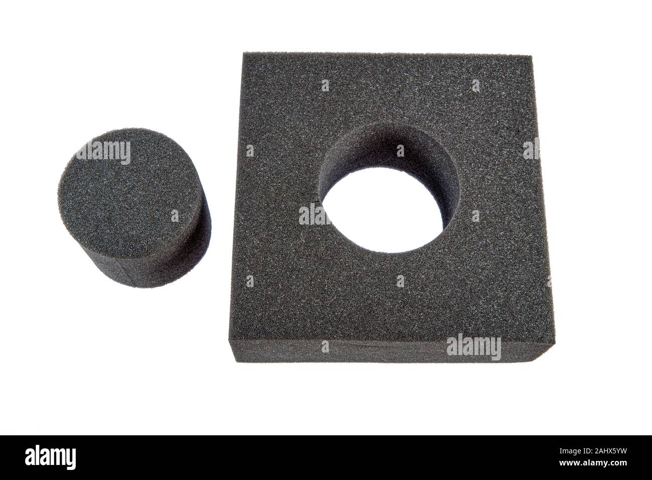 Technical Round Sponge. Black sponge foam in a shape of electronic or ...