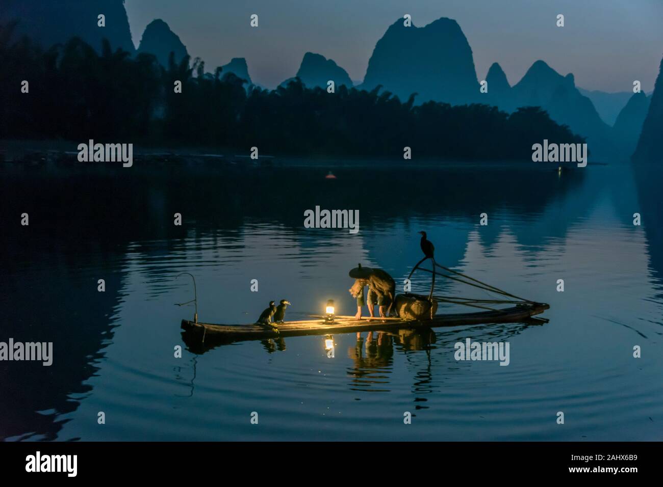 Preparing to fish with comorants, Li River, Guilin, China Stock Photo ...
