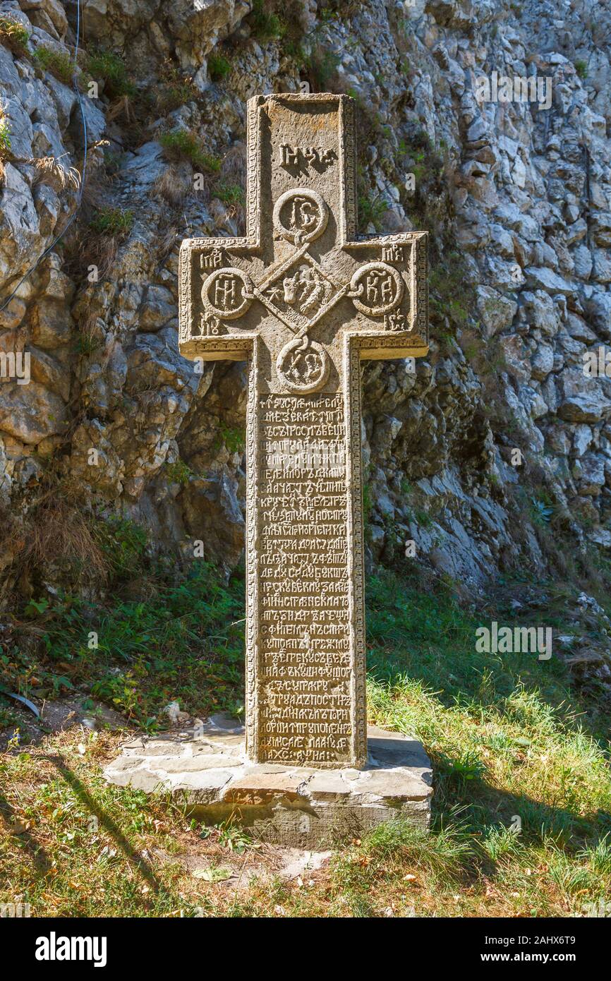 Stone cross at the foot of the eastern shield wall of medieval Bran ...