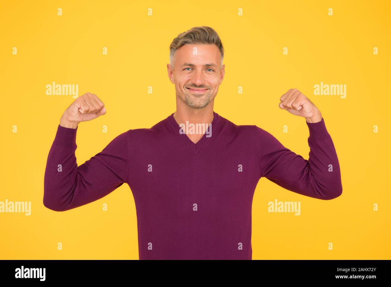 Confidence is best outfit. Confident man yellow background. Handsome ...