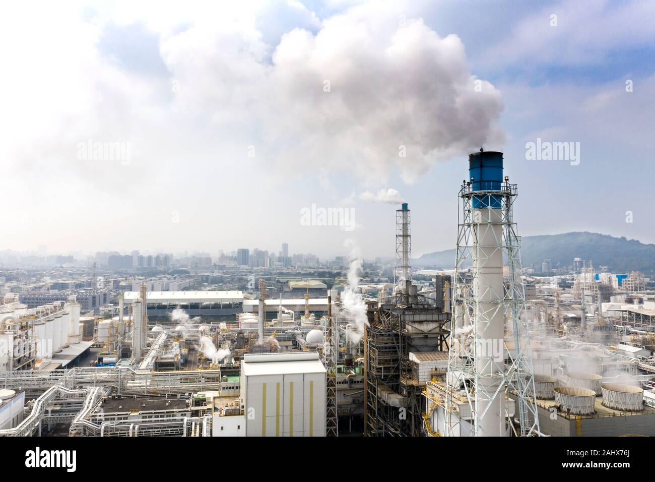 Aerial view of industrial area with chemical plant. Smoking chimney ...