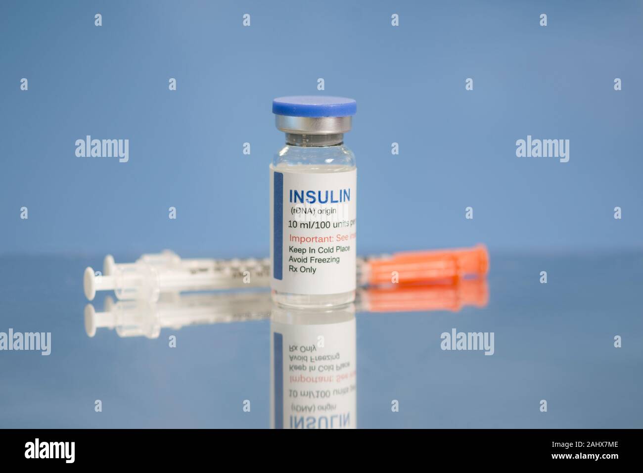 Human Insulin vial and two syringes on metal reflective tray Stock ...