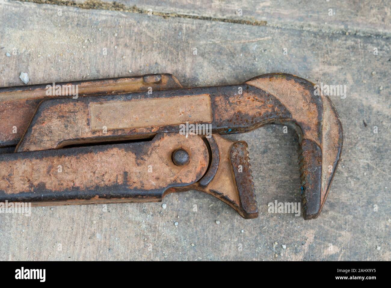 vintage rusty pipe wrench isolated on white background, top view Stock ...
