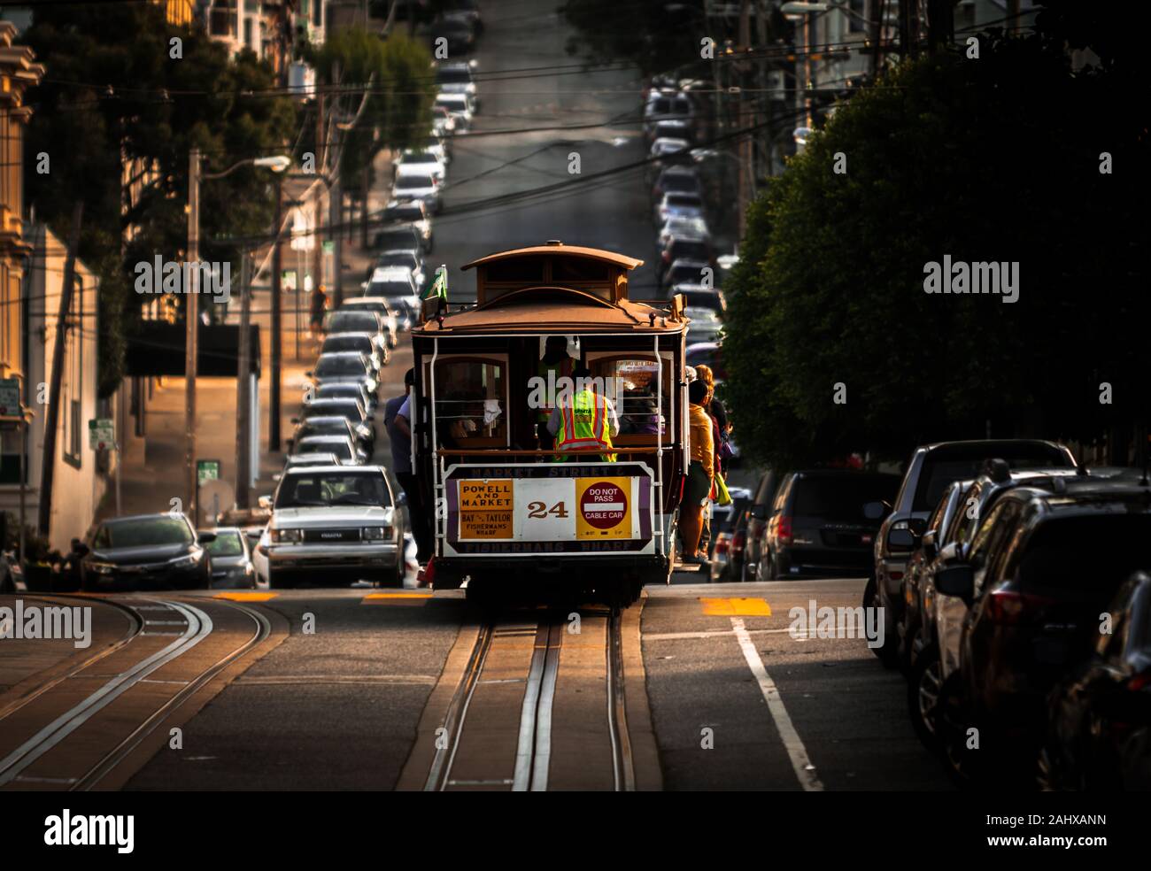 powell street tram viewed from behind through an intersection, historic ...