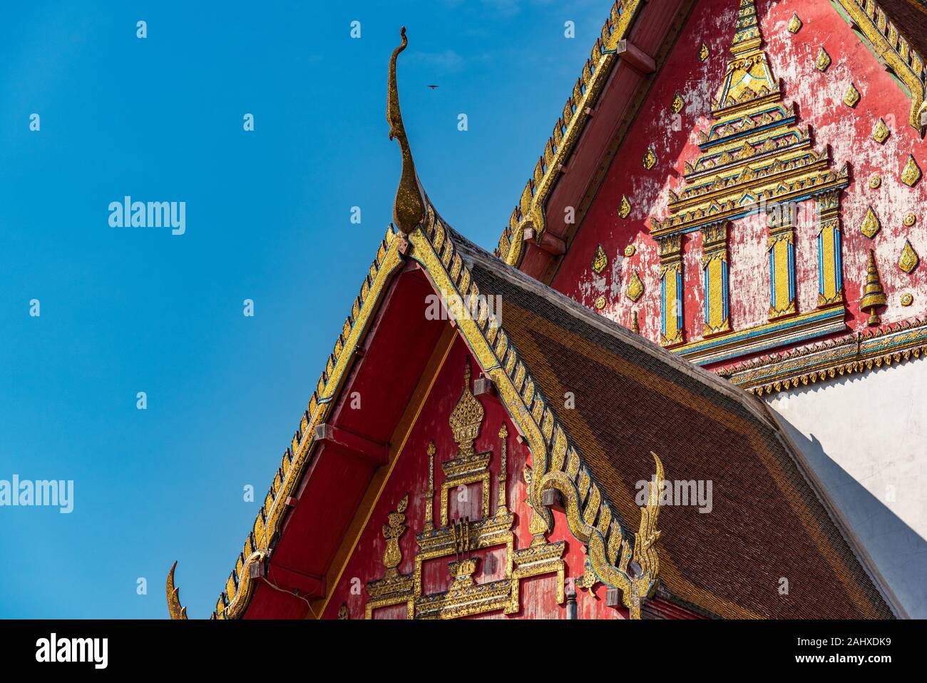Beautifully decorated roof. Traditional Thai architecture design detail ...