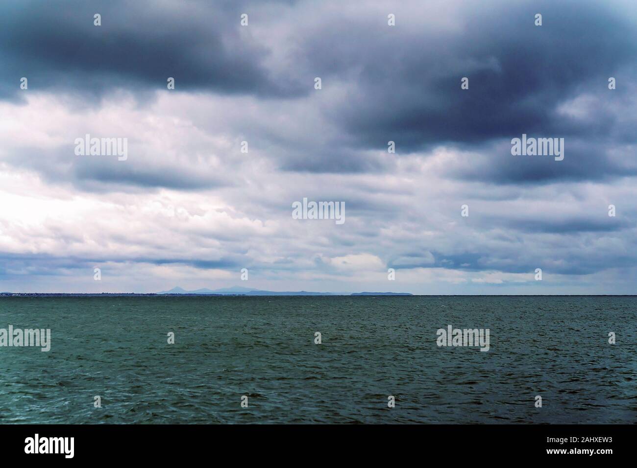 Light rain falling obscuring vision and softening the landscape as ...