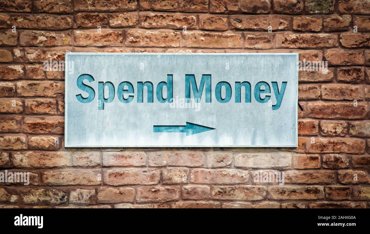 Street Sign the Direction Way to Spend Money Stock Photo - Alamy