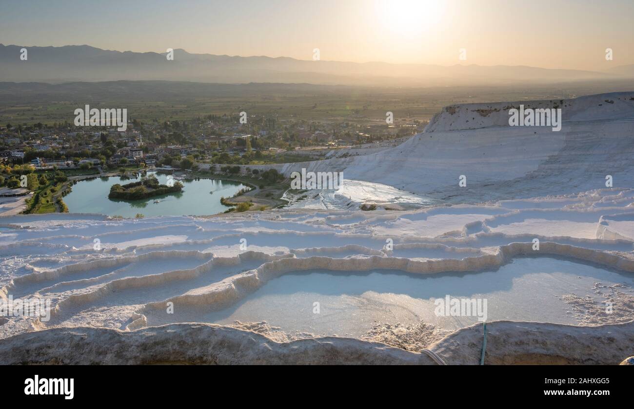 Beautiful sunset and Natural travertine pools and terraces in Pamukkale ...