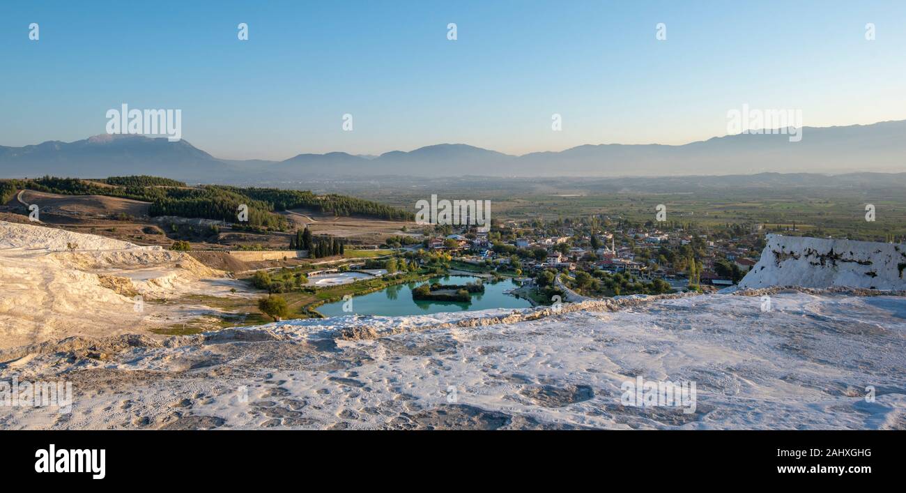 Beautiful sunset and Natural travertine pools and terraces in Pamukkale ...