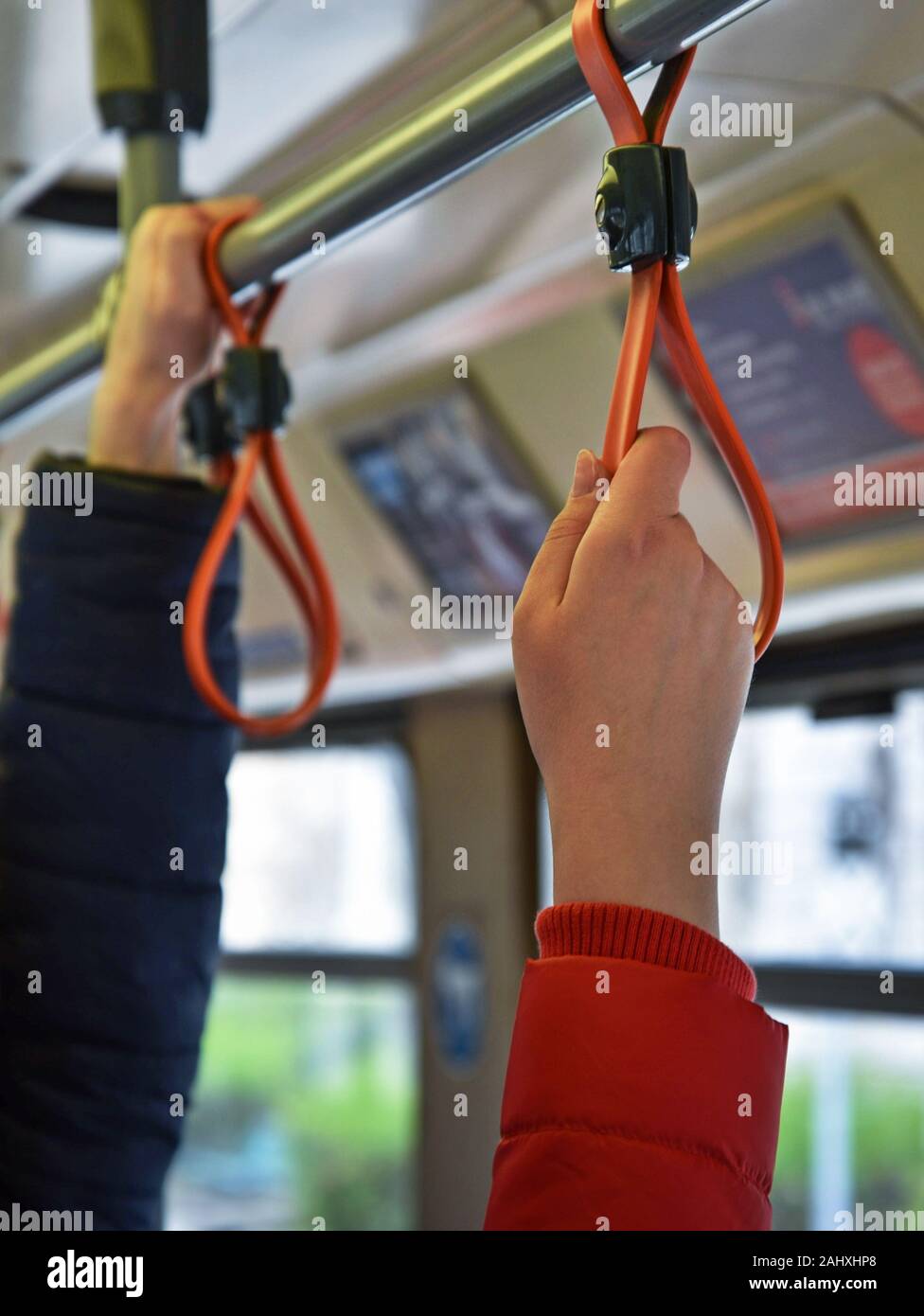 Tram pole hold commuter hi-res stock photography and images - Alamy