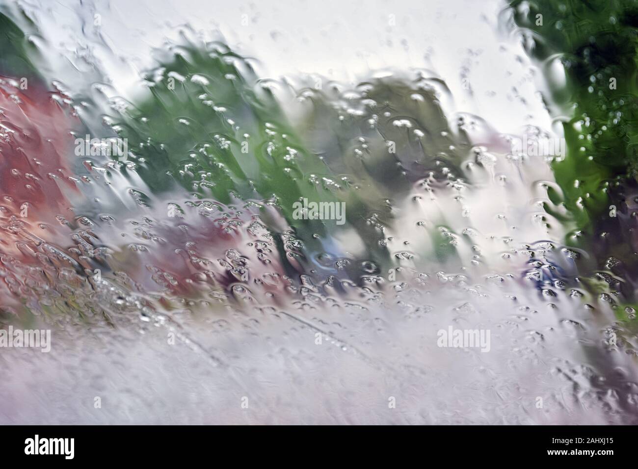 Natural window with flowing rain water Stock Photo - Alamy