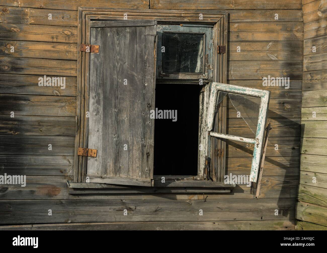 Broken window frame of old wooden house Stock Photo - Alamy