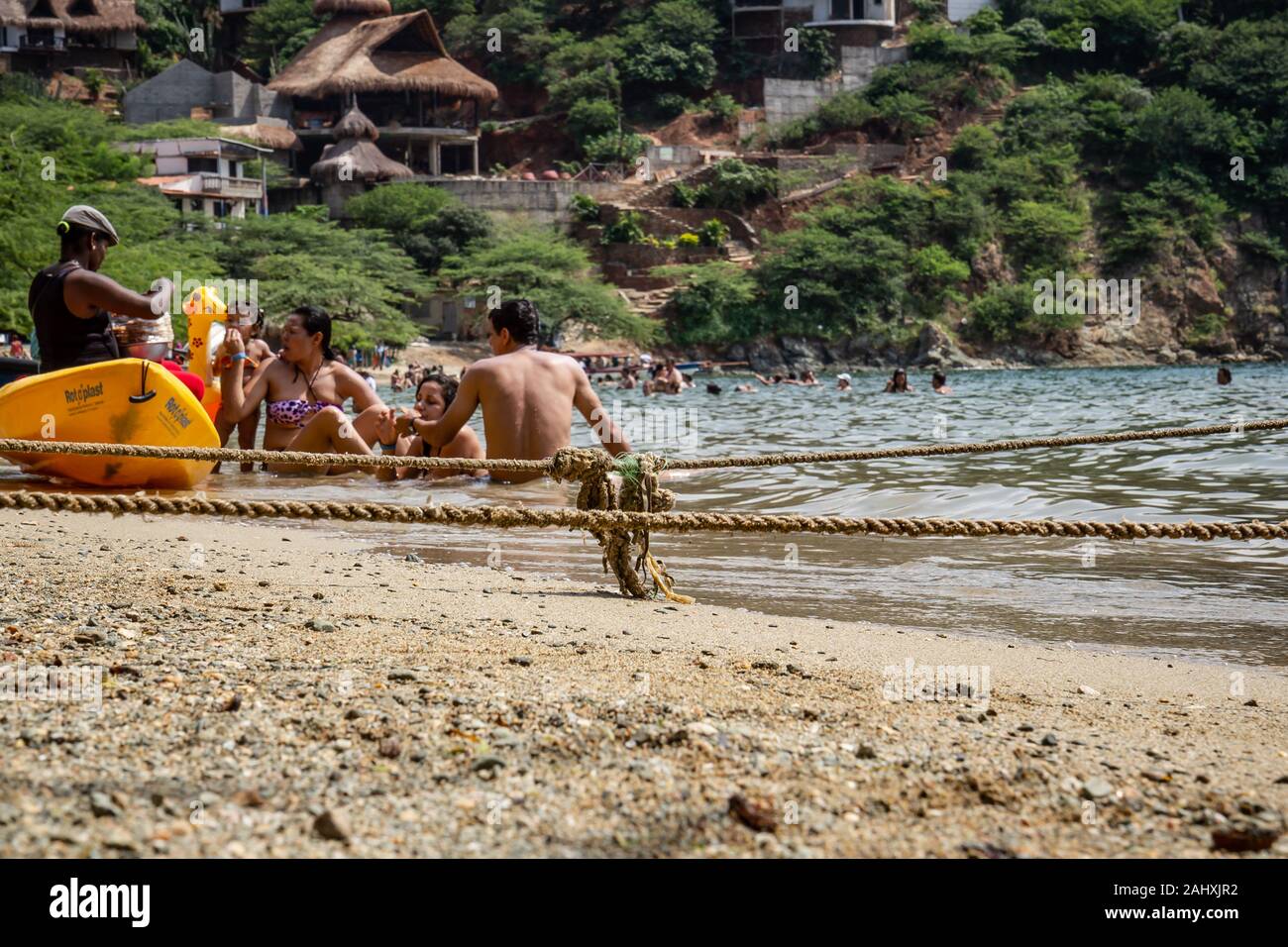 Sunny weekend on Caribbean beach, Colombia Stock Photo - Alamy