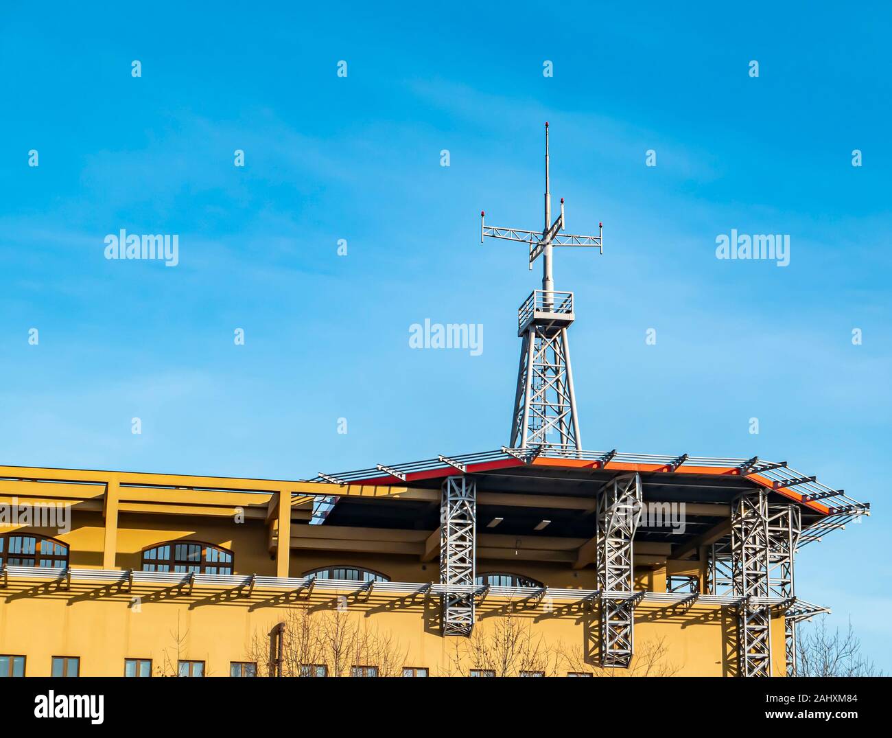 Helipad on the roof of a building with a blue background. Technology ...