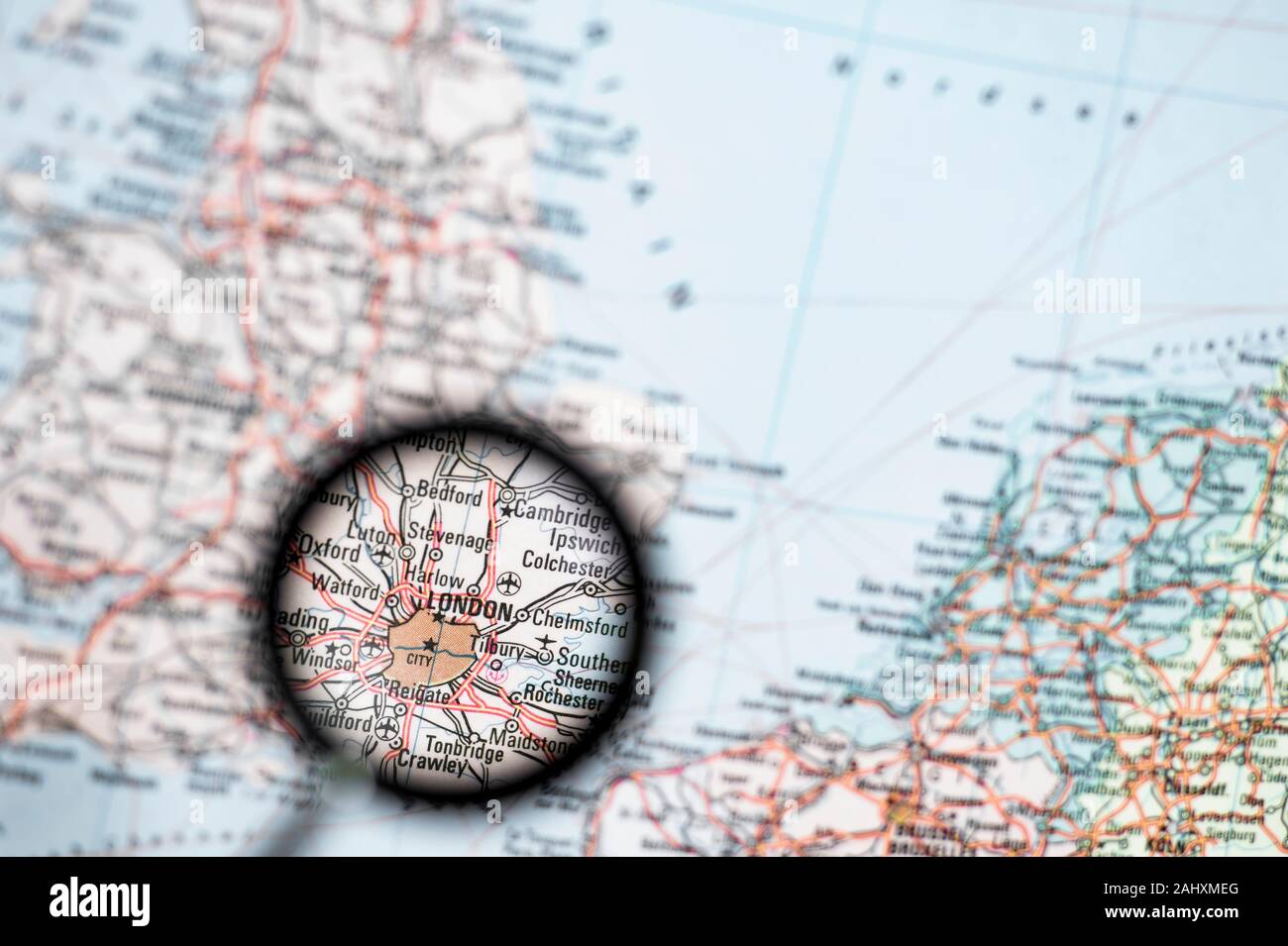 London UK capital close-up through a magnifying glass on the background ...