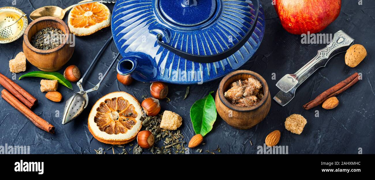 Natural ingredients for tea.Porcelain blue teakettle.Useful tea with ...