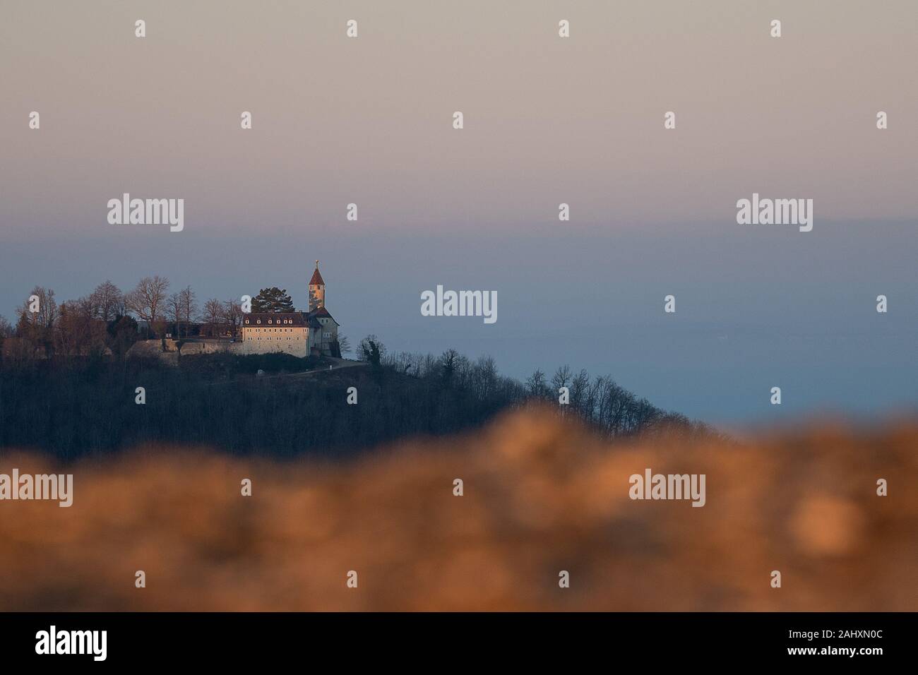 Bissingen An Der Teck, Germany. 02nd Jan, 2020. The Teck castle glows ...