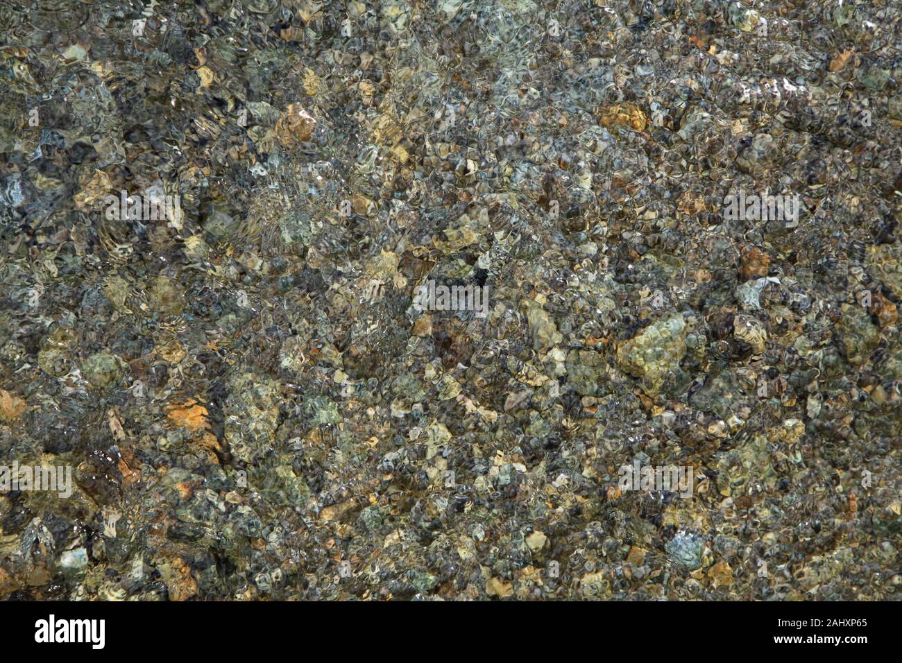 Mosaic texture with the golden shade (tint) in the sunrays. The bottom ...