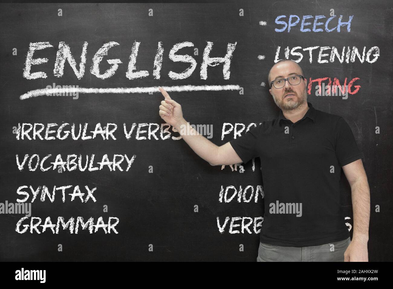 Teacher pointing board classroom hi-res stock photography and images ...