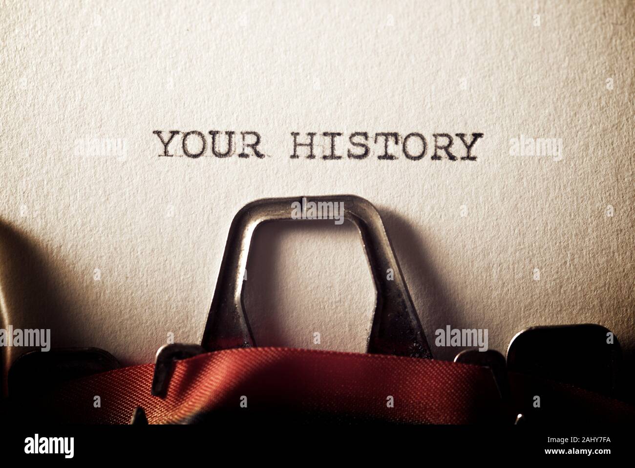 The sentence, Your History, written with a typewriter Stock Photo - Alamy