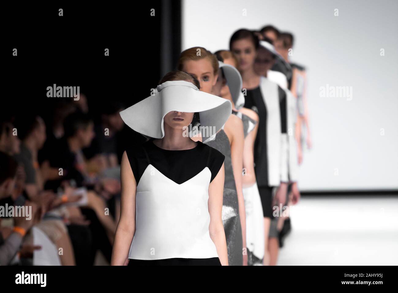 Fashion show, catwalk event, models on the runway. Fashion week themed ...