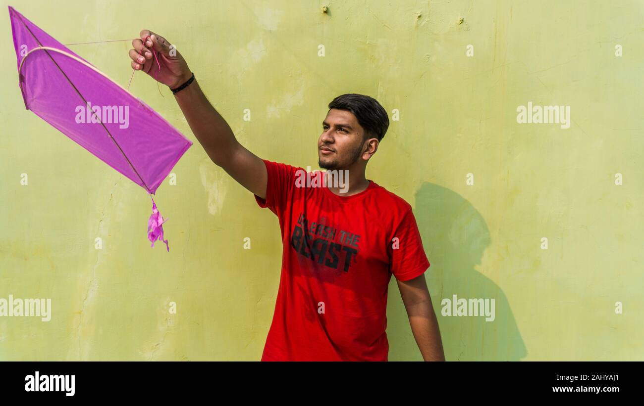 Young man with Patang(kite) for Makar Sankranti festival of India ...