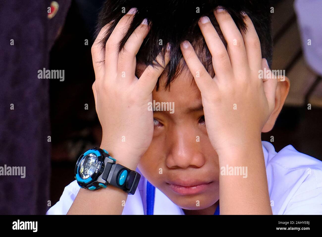 Shah Alam, Malaysia. 02nd Jan, 2020. A year one pupil seen crying on ...