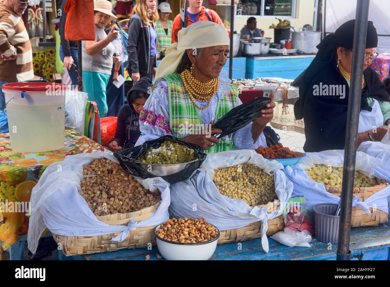 Food seller at the Saturday Artisan's Market, Otavalo, Ecuador Stock ...
