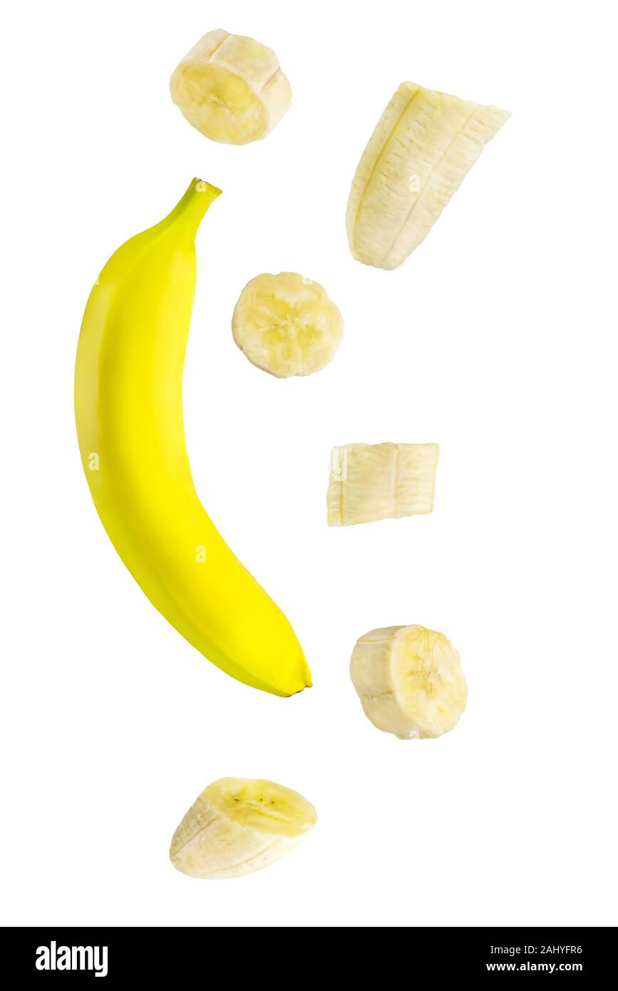 Isolated falling fruits. Falling banana fruit isolated on white ...
