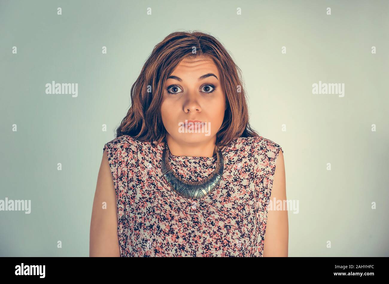Confused woman. Closeup portrait angry unhappy young person shrugging ...