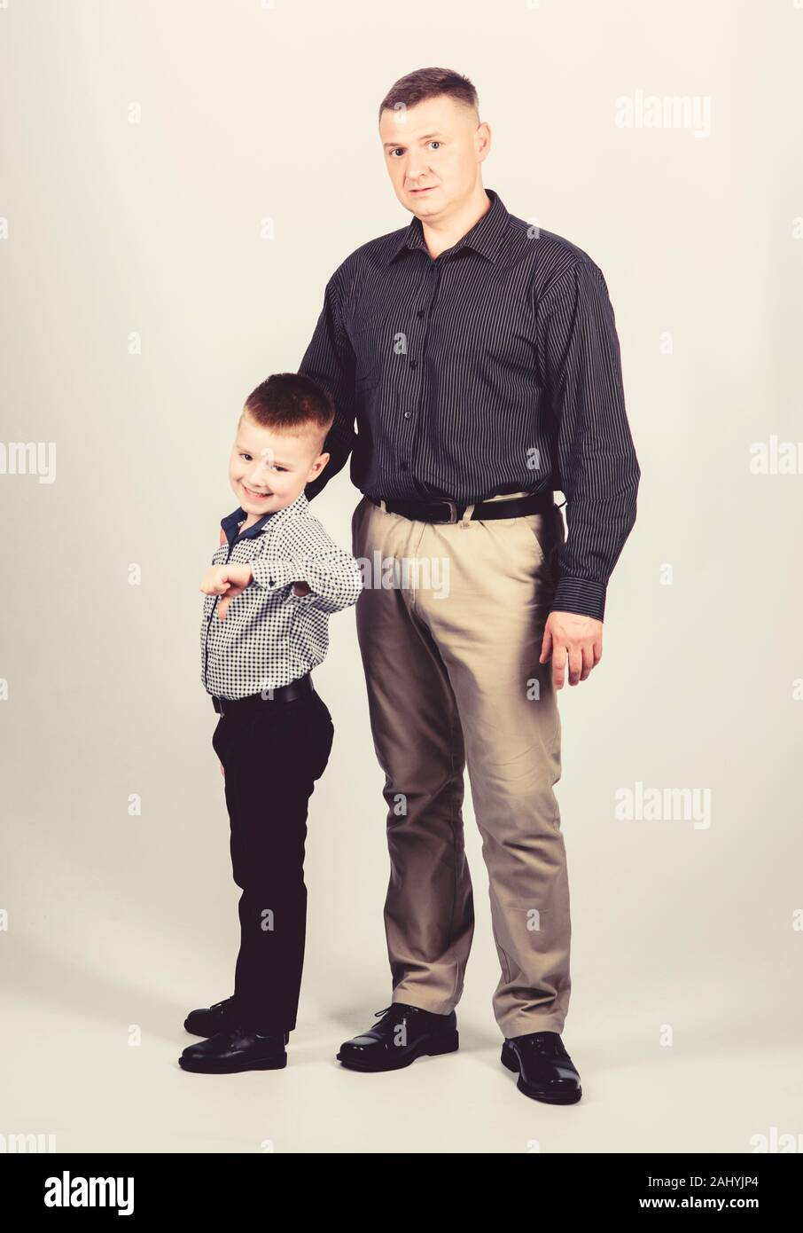 child with father. business partner. little boy with dad businessman ...
