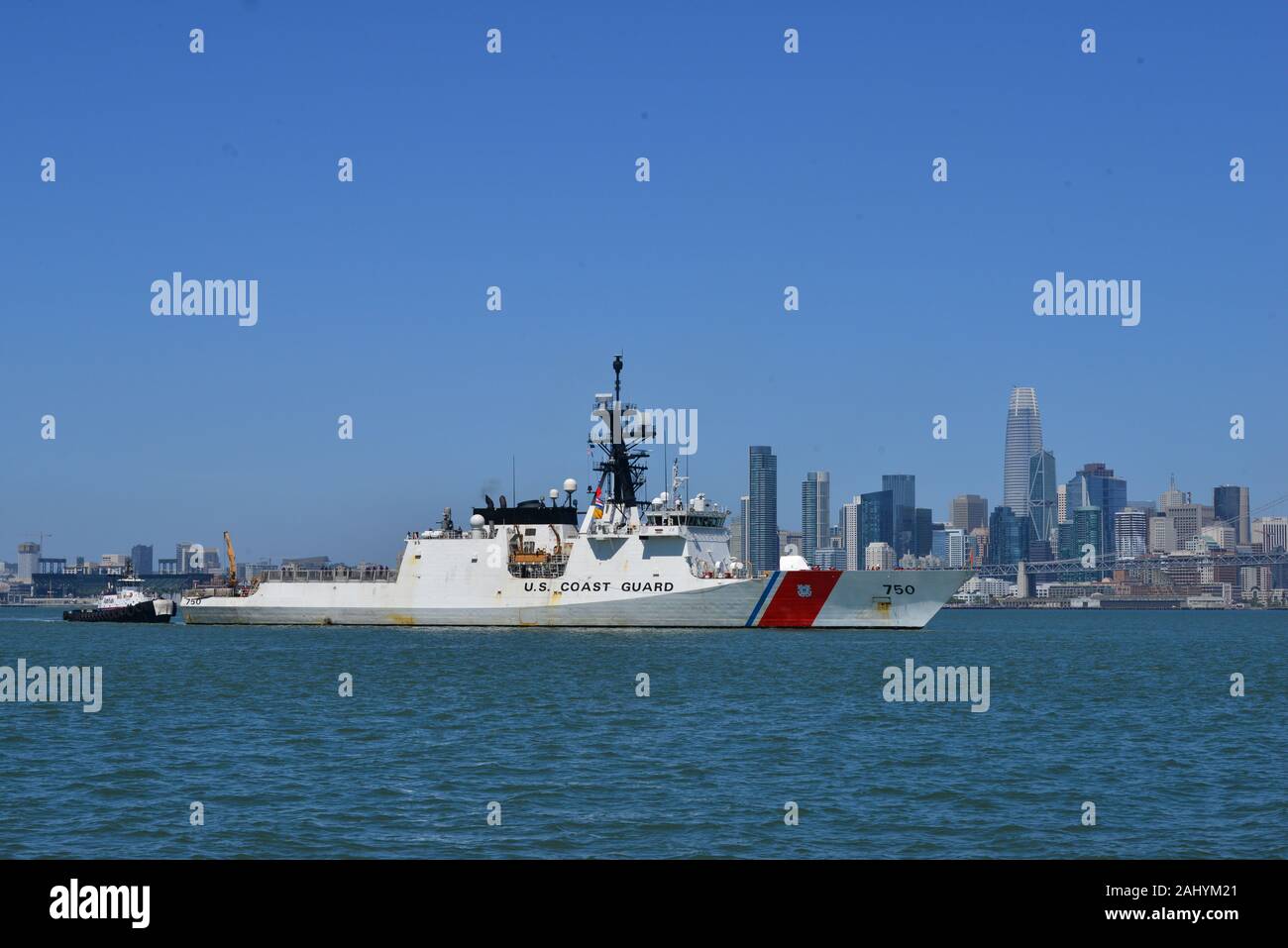 The crew aboard the Coast Guard Cutter Bertholf (WMSL 750) navigate the ...