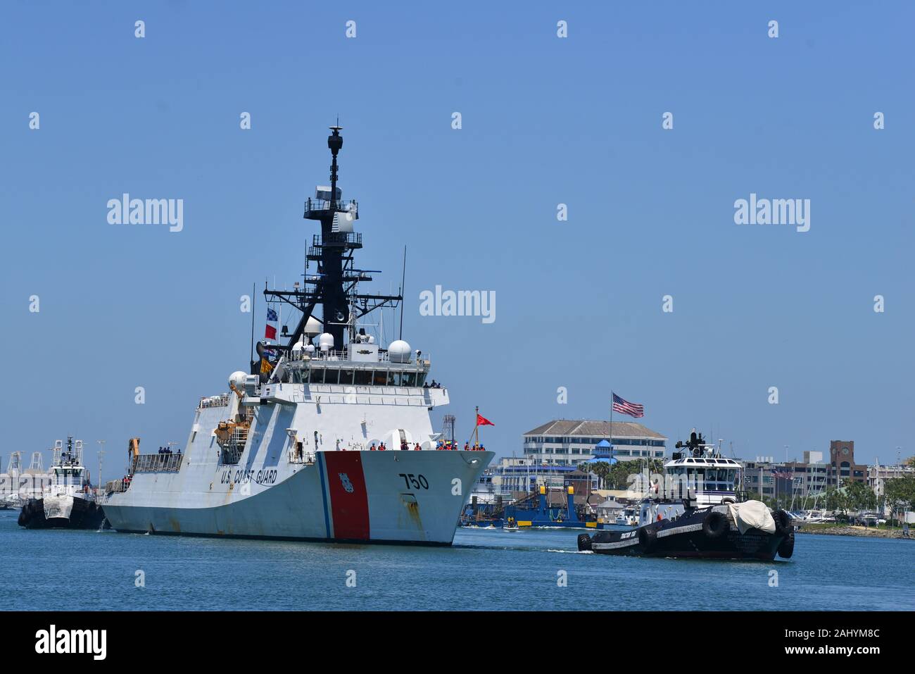 The crew aboard the Coast Guard Cutter Bertholf (WMSL 750) navigate the ...