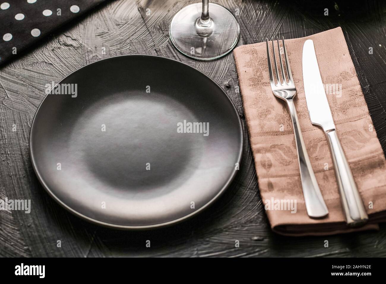 Dishware, menu and table concept - Empty tableware with beige napkin ...