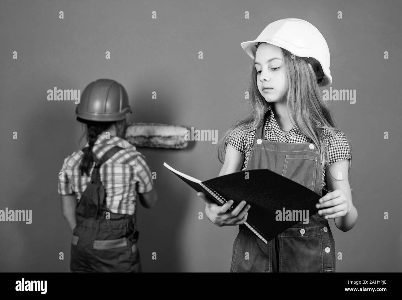 small girls repairing together in workshop. Tools to improve yourself ...