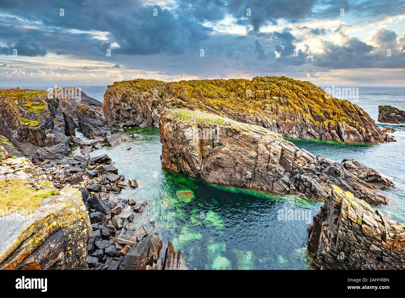 Sea stacks and cliffs at the Butt of Lewis on the Isle of Lewis in the ...