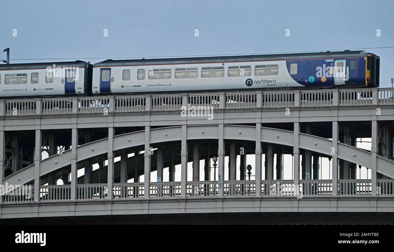 Train travels across railway bridge hi-res stock photography and images ...