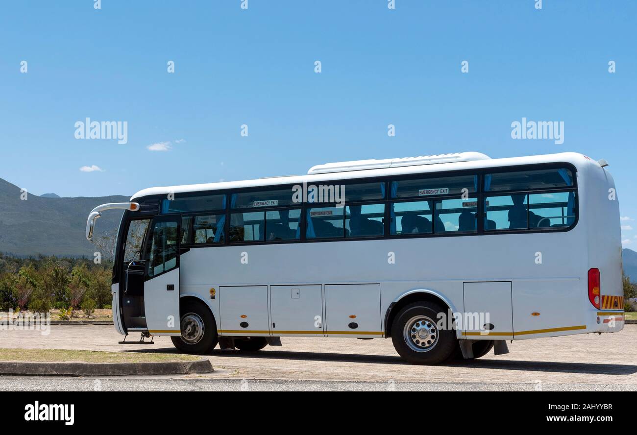 South Africa. December 2019. A white painted tourist coach. Single deck ...
