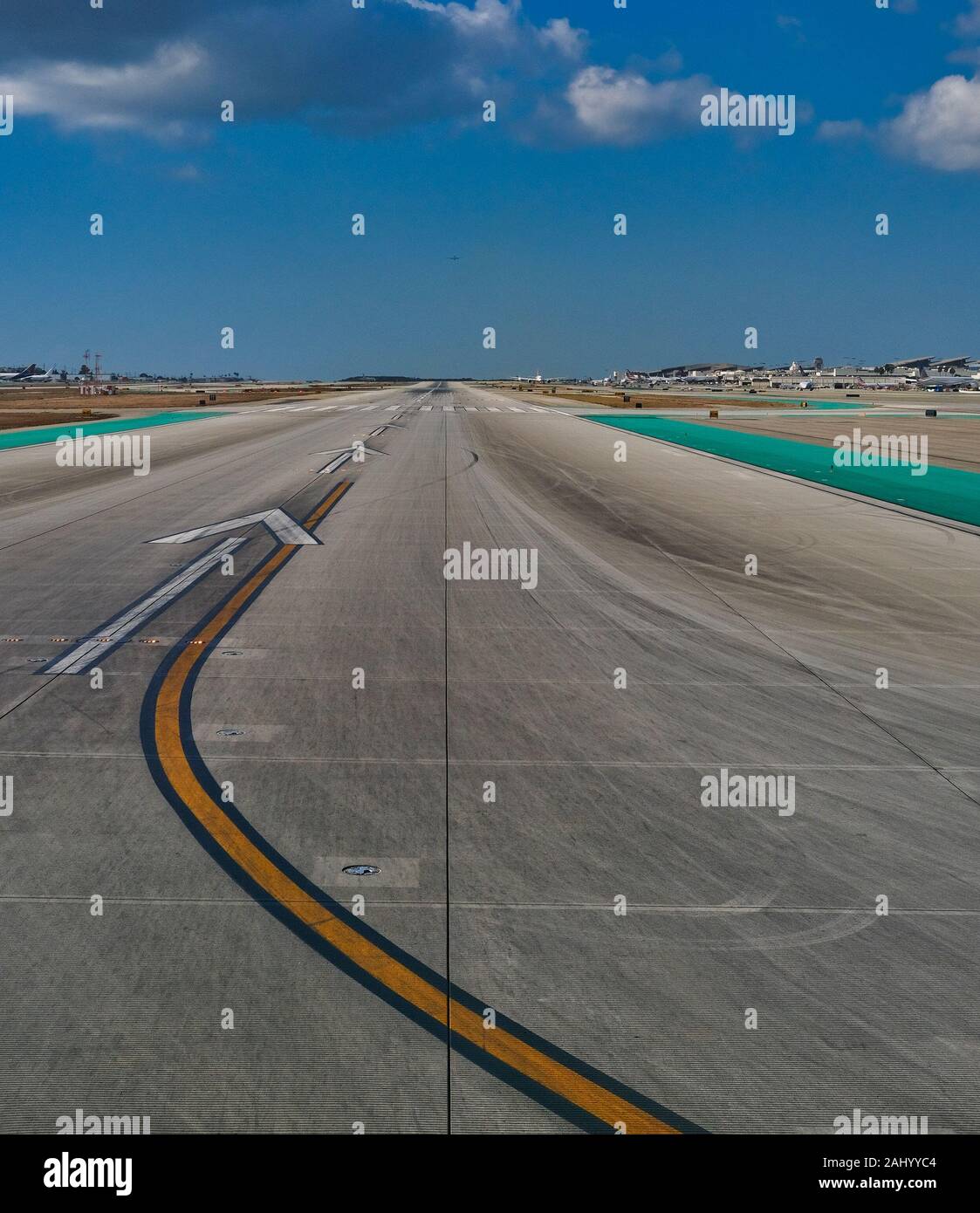 Empty Runway into Distance Stock Photo - Alamy