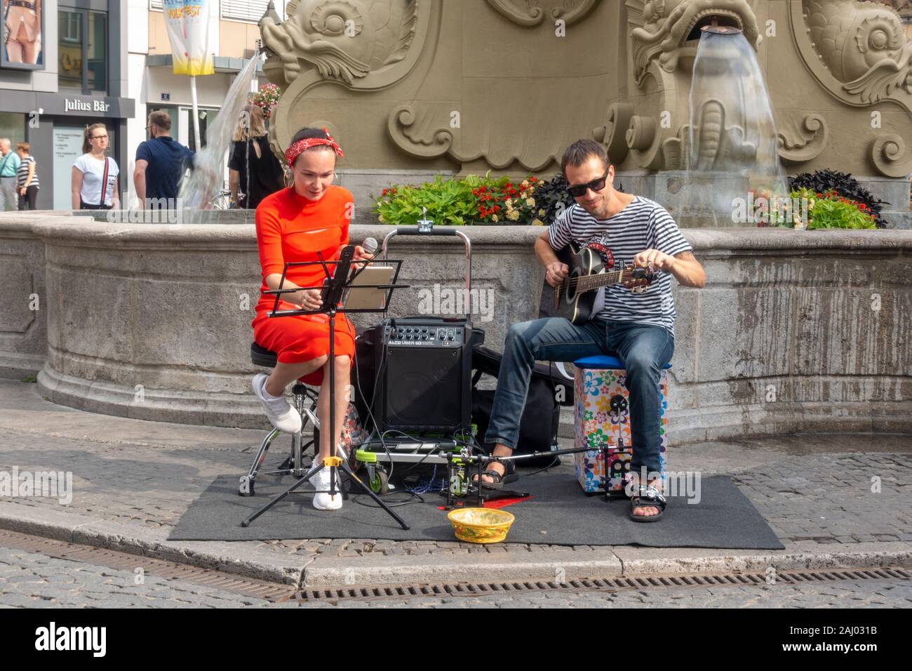Musicians busking on the streets of Würzburg, Bavaria, Germany Stock ...