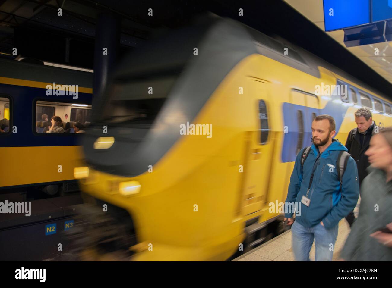 Passenger Leaving A NS Train At Schiphol The Netherlands 2019 Stock ...