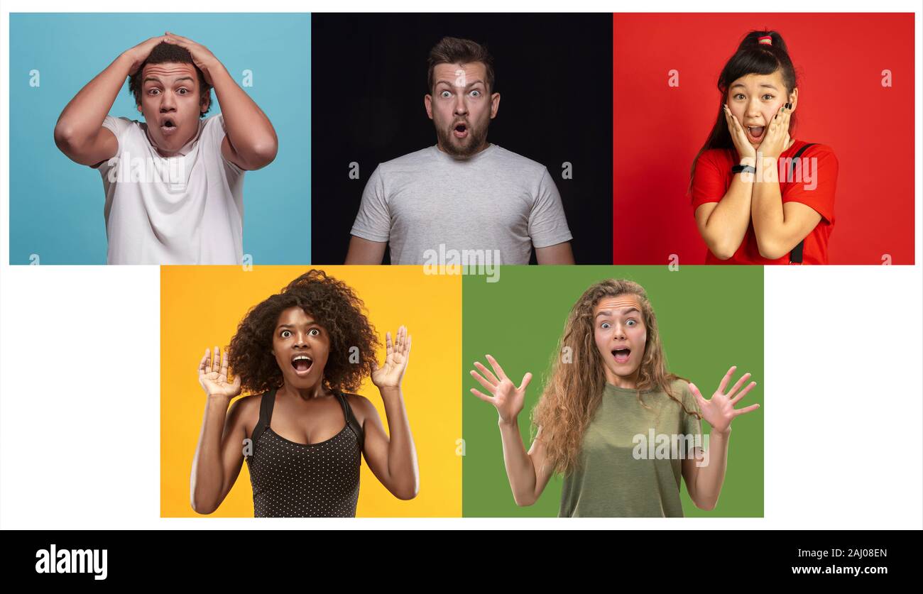 Portrait of group of young people isolated on multicolored studio ...