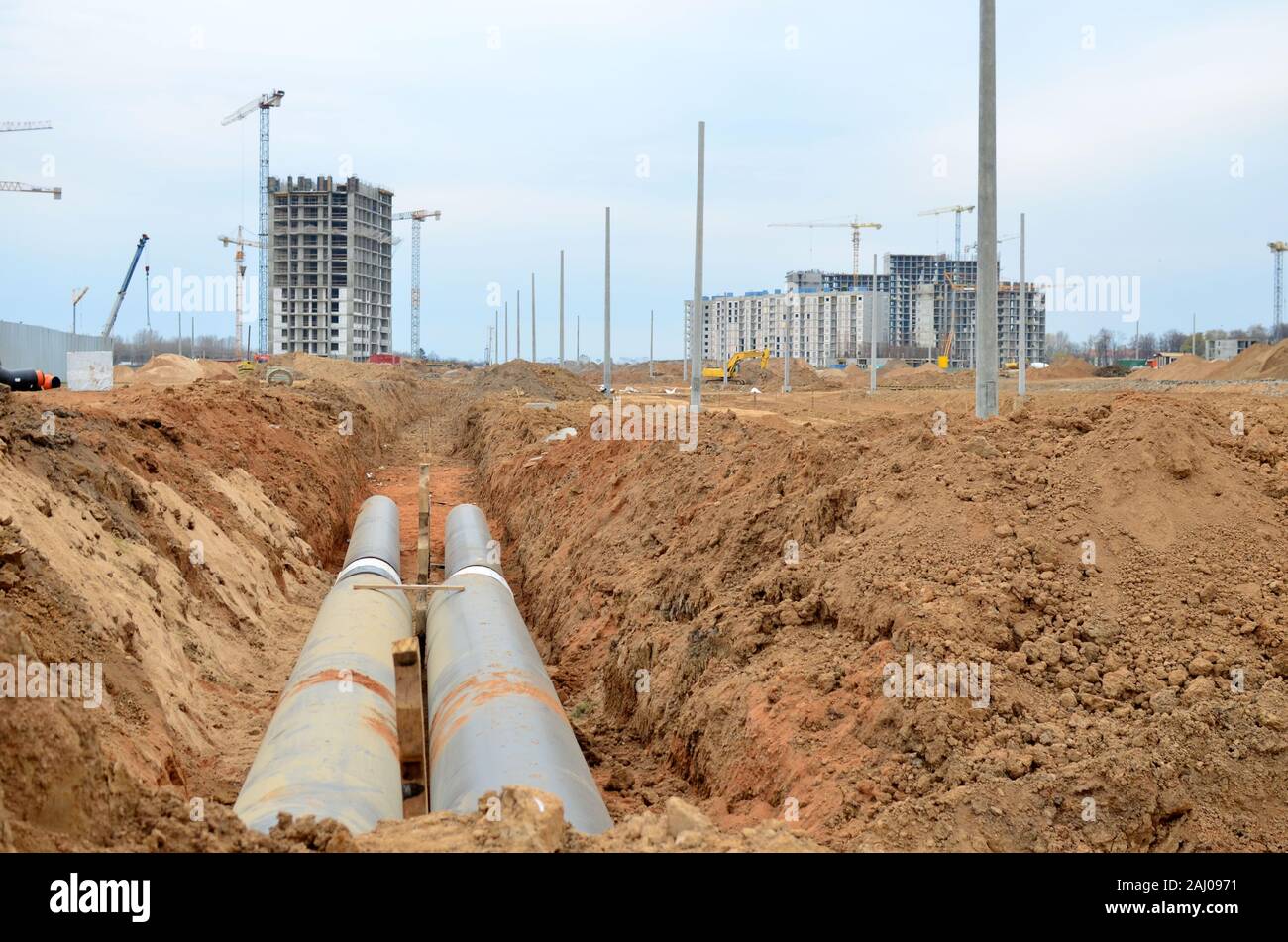 Natural gas pipeline construction work. A dug trench in the ground for ...
