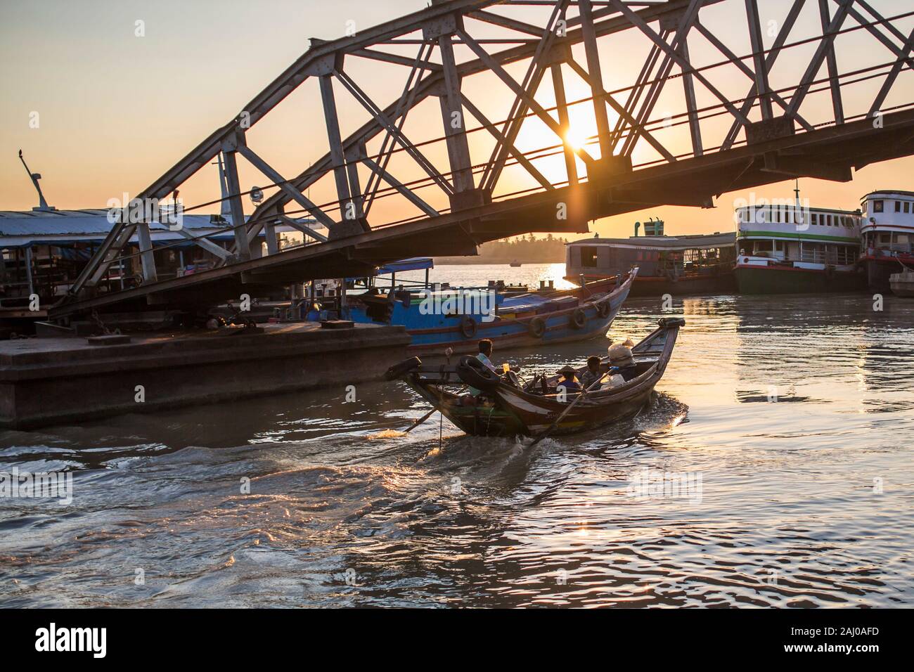 Boat with passengers leaving jetty pier in Yangon , Myanmar Stock Photo ...