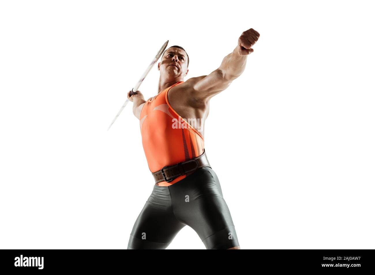 Male athlete practicing in throwing javelin isolated on white studio ...